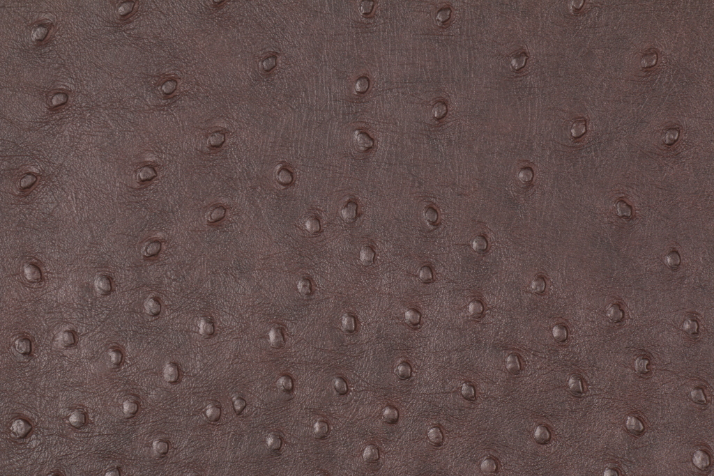 Ostrich Embossed Vinyl Upholstery Fabric in Dark Brown