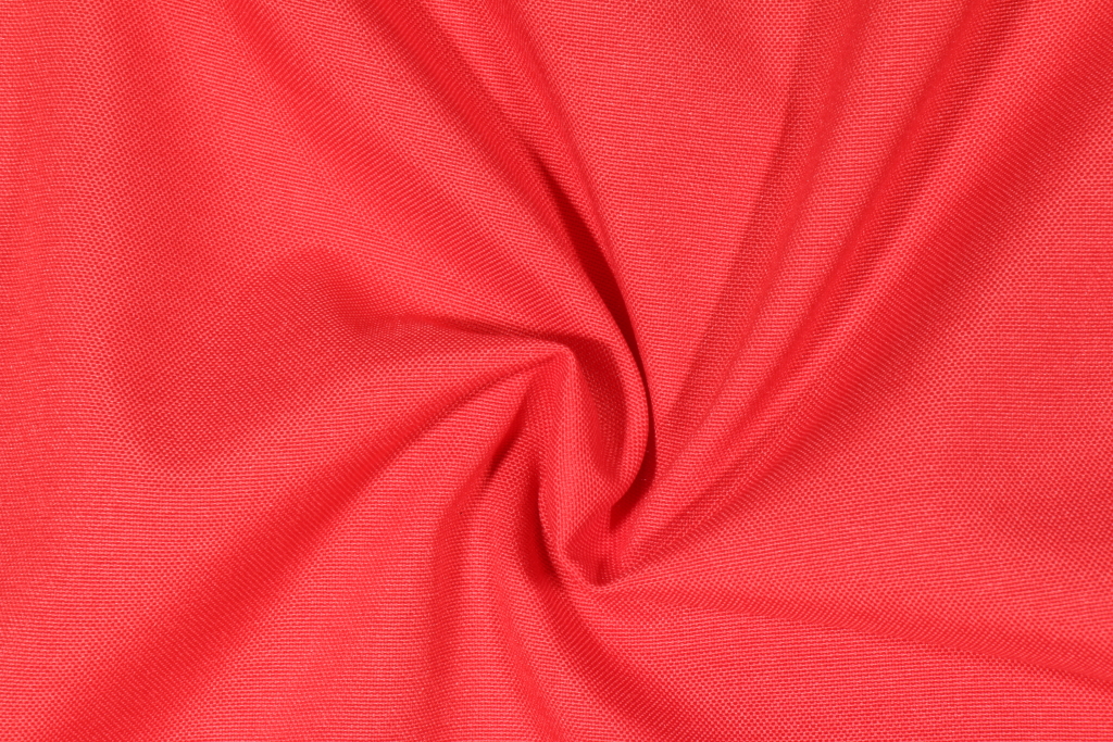 Waverly Sunburst Sun & Shade Woven Polyester Outdoor Fabric in Coral