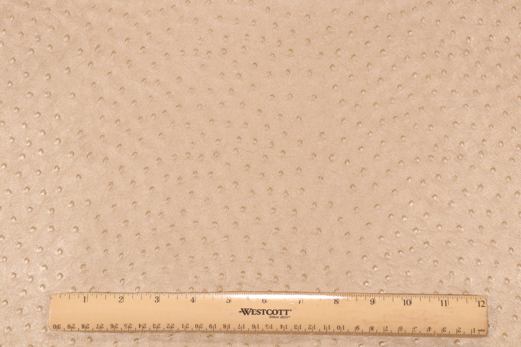 Emu Patterned Vinyl Upholstery Fabric in Gold Leaf
