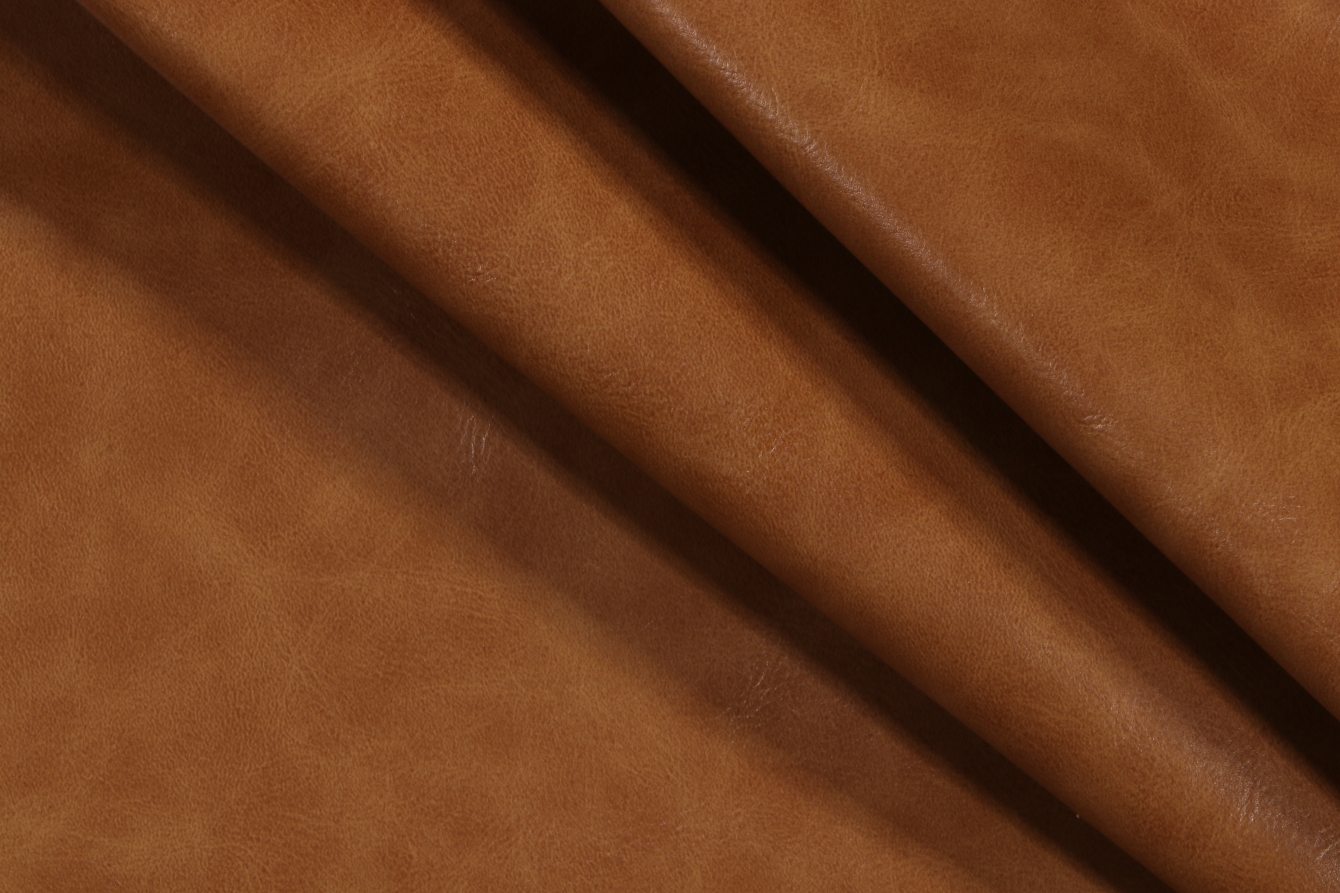 7.5 Yards Calderon Vinyl Upholstery Fabric in Cognac