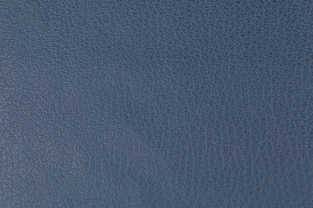 Canyon Textured Vinyl Upholstery Fabric in Atlantic
